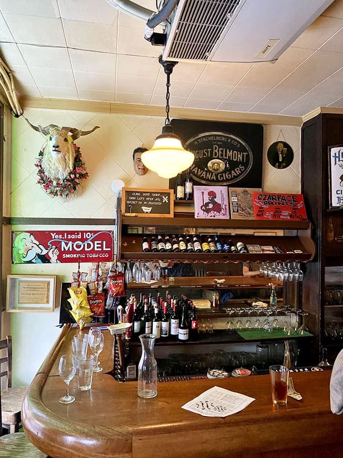 Behind the bar, spirits stand at attention while vintage advertisements and quirky d&eacute;cor create the visual equivalent of comfort food for the eyes.
