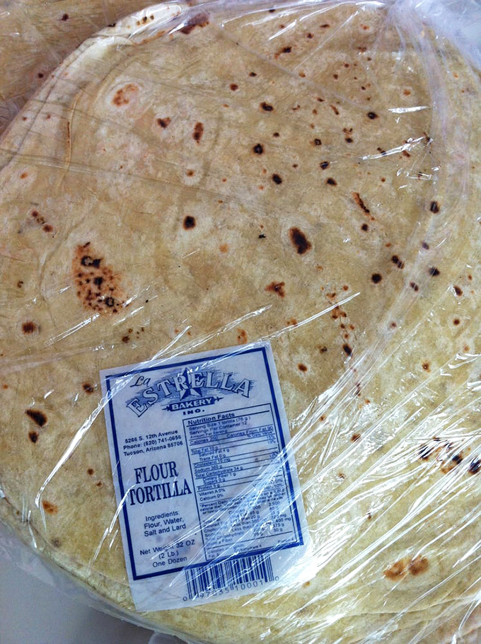 Fresh flour tortillas, wrapped and ready – these aren't just food staples, they're edible blank canvases for countless Mexican meals.