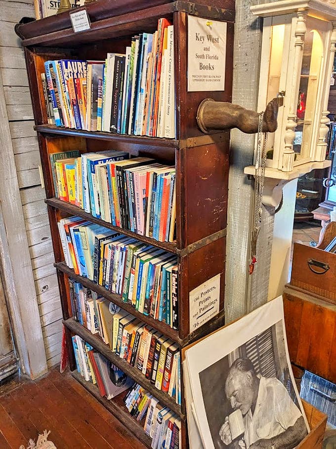 Literary legends watch over browsers from framed portraits, as if ensuring their beloved Key West continues inspiring new generations of storytellers.