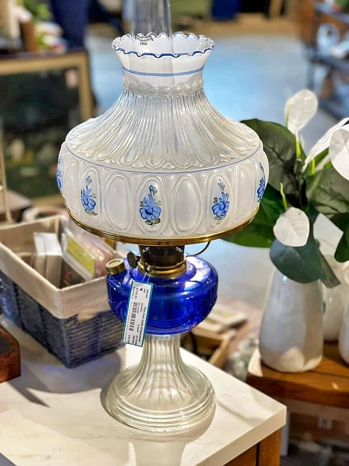 This isn't just a lamp; it's a lighthouse guiding you through design history, its blue base and delicate shade whispering tales of evenings spent reading by its glow.