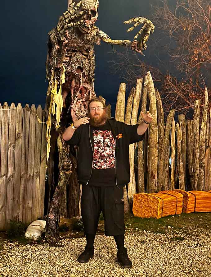 The attraction brings joy even amid the scares, as evidenced by these visitors enjoying the festive holiday-themed display area.