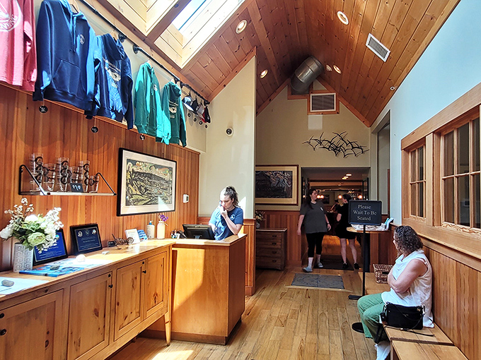 The welcoming entrance area sets the tone for the experience ahead, with merchandise that lets you take a piece of Maine home.