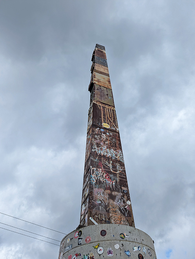 The cabinet's impressive verticality draws the eye upward, a rusty exclamation point against Vermont's characteristically moody skies.
