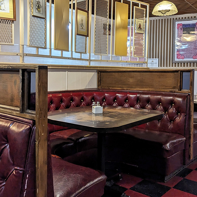 These burgundy booths could tell stories &ndash; decades of first dates, family celebrations, and regular customers who've claimed the same spot for years.