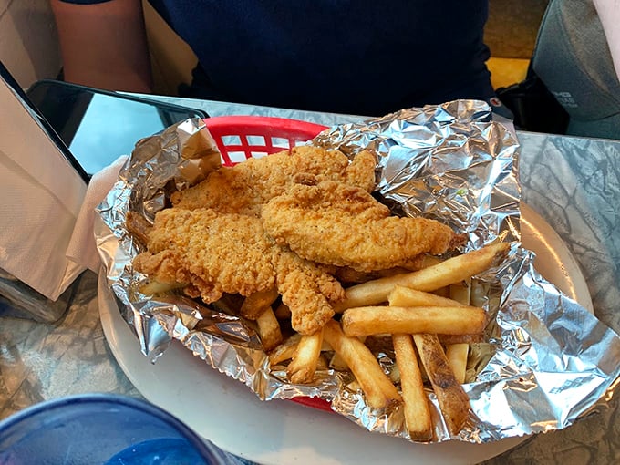 Crispy chicken tenders and fries &ndash; sometimes the simplest pleasures are the best. Golden, crunchy coating gives way to juicy chicken inside.