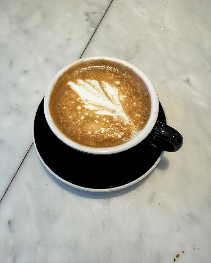 Latte art so pretty, it belongs in MoMA. This cup isn't just coffee, it's a caffeinated Picasso that will wake up your taste buds.