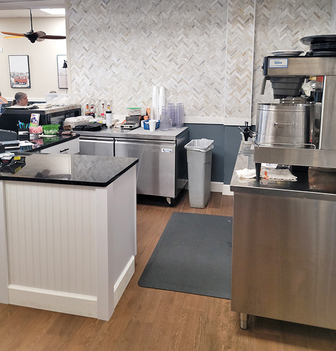 The counter area offers a front-row seat to breakfast magic &ndash; where coffee flows freely and orders fly out with precision.