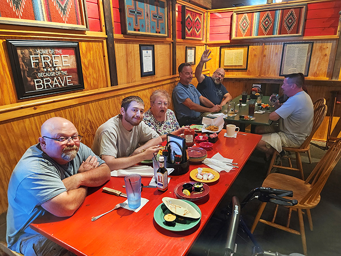 Multi-generational gatherings happen naturally at Mac's, where the food brings families together and creates new memories around the table.