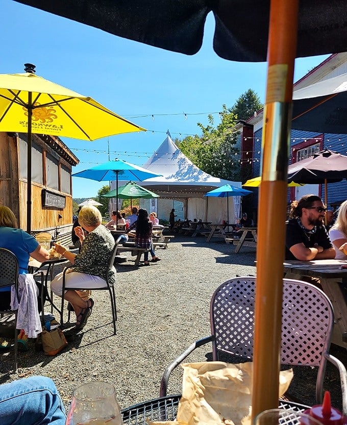 Colorful umbrellas shade happy patrons enjoying that perfect Vermont combination &ndash; great food, fresh air, and zero pretension.