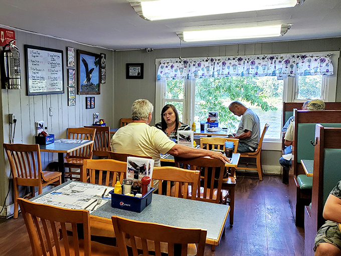 The restaurant's relaxed atmosphere encourages lingering conversations over exceptional seafood and riverside views.