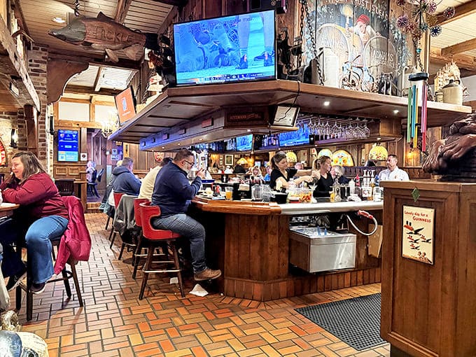 The circular bar becomes command central for both regulars and newcomers, where bartenders orchestrate drinks with practiced precision.