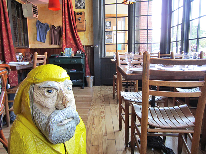 Wooden chairs, natural light, and is that a carved figure in a yellow raincoat? Quirky touches make The Bobcat feel like dining in a friend's eccentric home.