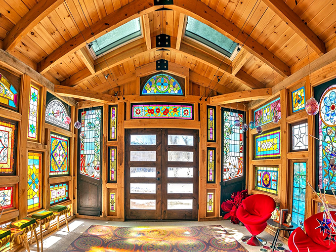 This isn't just a doorway; it's a masterclass in stained glass storytelling. Even the ceiling joins the colorful conversation in this light-filled sanctuary.