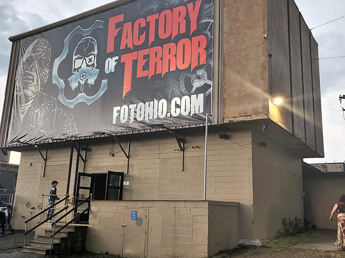 The unassuming exterior hides the nightmares within – like a horror movie disguised as an office building.