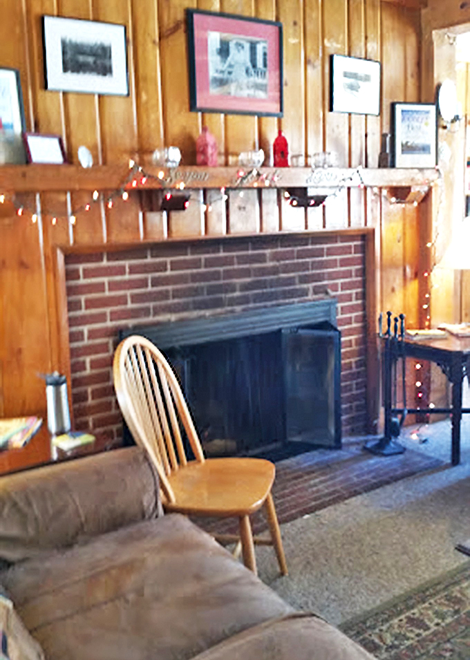 Cozy corner alert: This rustic fireplace has probably heard more stories than a small-town librarian.