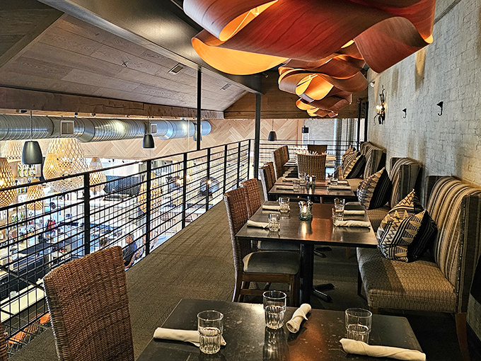 The mezzanine level offers a bird's-eye view of the restaurant below &ndash; perfect for people-watching while savoring your pasta perfection.