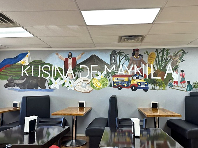 A vibrant mural transports diners straight to the Philippines, featuring iconic symbols from the colorful jeepney to tropical flowers and landscapes.