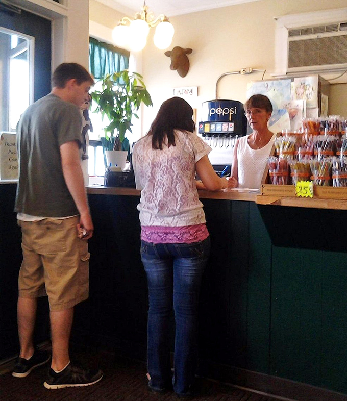 The welcoming service counter where regulars are greeted by name and newcomers quickly feel like part of the family.