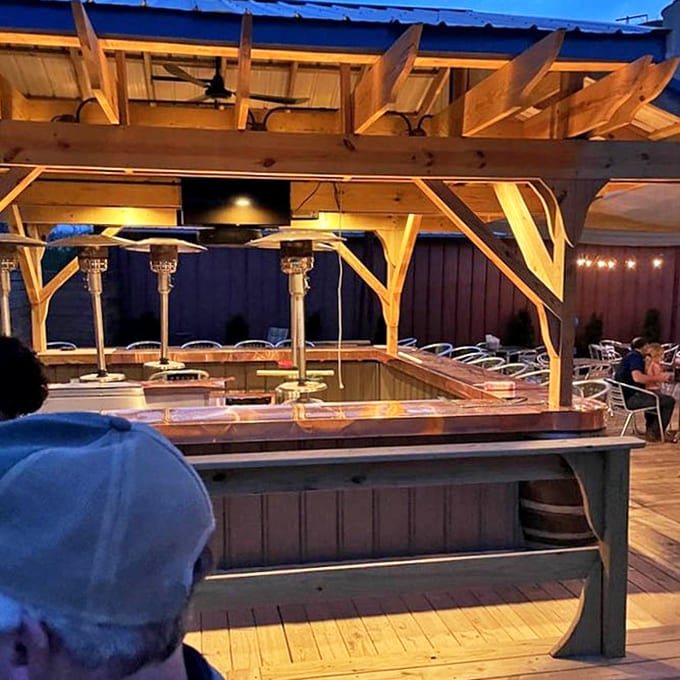 When weather permits, the outdoor bar area offers fresh air and sunshine to complement your oversized sandwich experience.