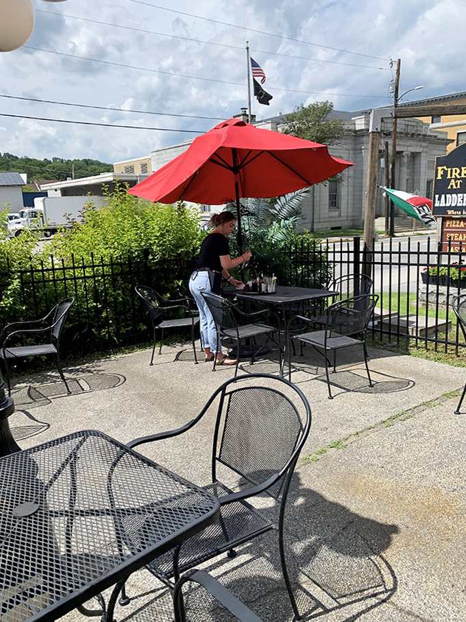 The restaurant's sign proudly announces its dual identity &ndash; historic firehouse and beloved eatery &ndash; with a promise of heroic flavors inside.