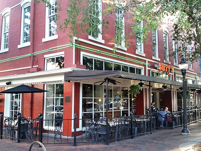 The outdoor patio offers prime people-watching real estate while you sip hurricanes and pretend you're actually on Bourbon Street.