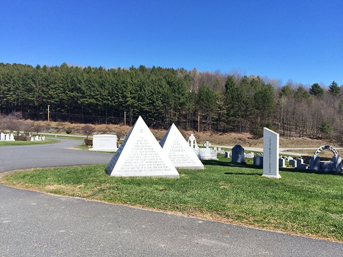 Pyramid monuments create a striking silhouette against Vermont's landscape, blending ancient symbolism with modern memorial art.