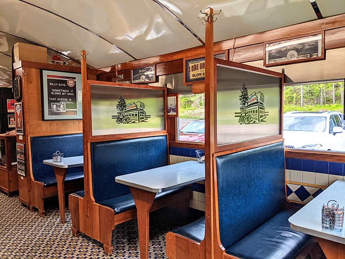 Booth seating that invites you to settle in, surrounded by wood paneling that's witnessed countless coffee refills.