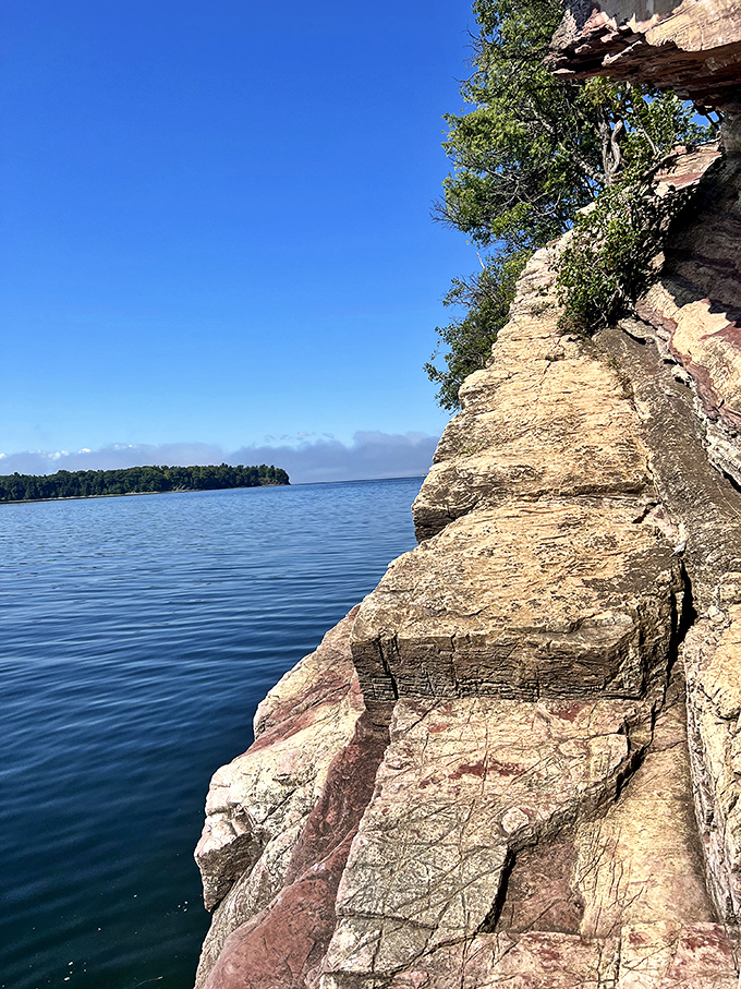 The famous red quartzite cliffs reveal 500 million years of geological history &ndash; nature's own time capsule standing proudly against the sky.