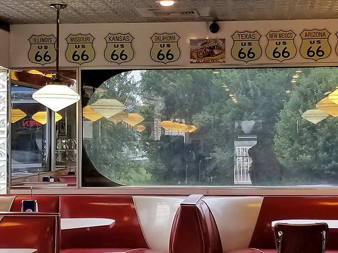 Get your kicks and your fix! These Route 66 signs aren't just decor. They're a roadmap to the heart of American diner culture.