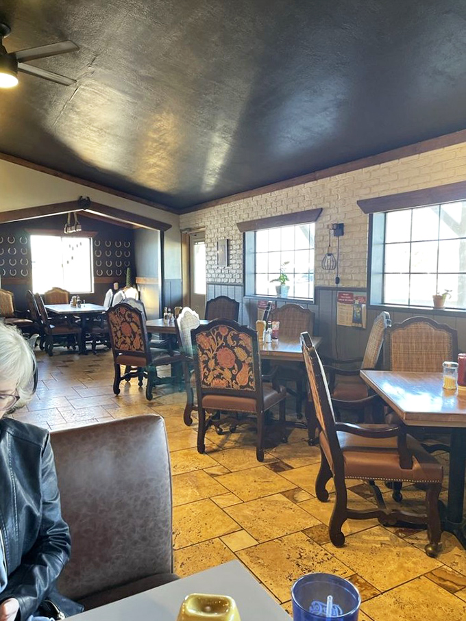 Warm lighting bathes the dining room in a golden glow &ndash; making every meal feel like a scene from a movie about finding joy in unexpected places.