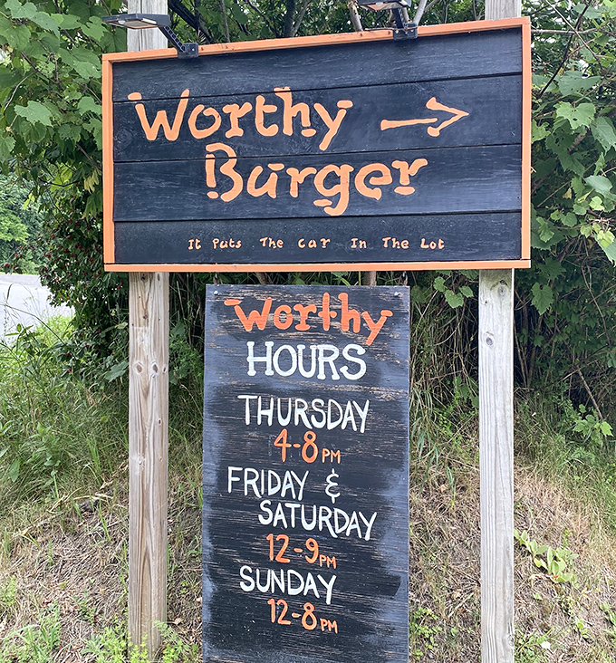 "It Puts The Car In The Lot" &ndash; Worthy Burger's sign displays Vermont's characteristic understated humor while quietly acknowledging their magnetic pull on hungry travelers.