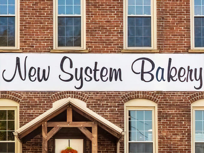 The welcoming entrance with its wooden stairs has supported generations of sugar-seekers, each step worn smooth by the pursuit of pastry perfection.