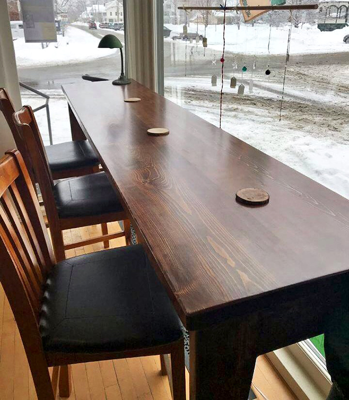 The window counter offers the perfect perch for people-watching, reading, or simply contemplating life while Vermont's seasons paint the town outside.