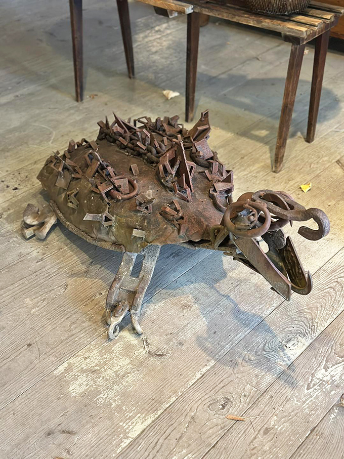 This sculptural metal turtle crafted from found objects proves that one person's scrap metal is another's artistic masterpiece.