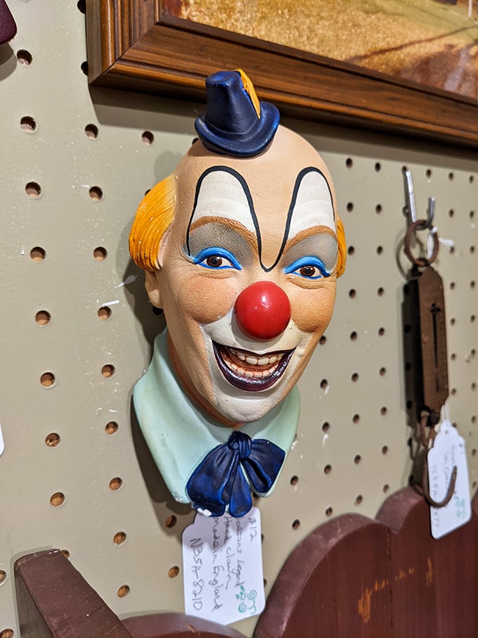 This vintage clown face might make some visitors walk a little faster, while collectors recognize it as a rare decorative piece.