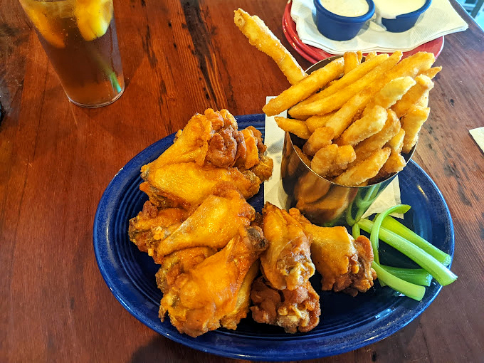 Golden-crisp wings that prove sometimes the best things in life come with extra napkins and no apologies.