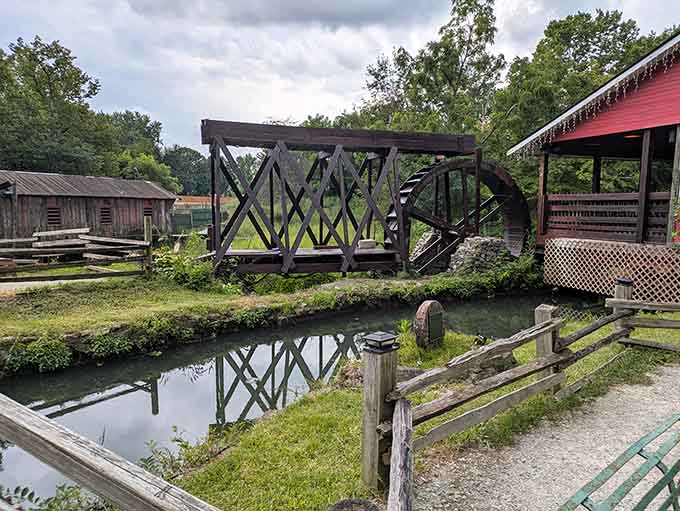 The wooden water wheel is the hardest-working piece of equipment you'll ever see, turning steadily and reliably like it's got nowhere else to be.
