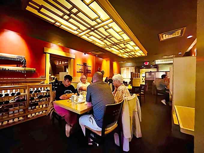 The dining room hums with satisfaction as patrons enjoy meals in booths designed for both comfort and conversation.