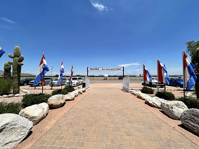 Flags waving goodbye, cacti standing tall&mdash;this exit is pure Americana with a dash of desert flair. Come back soon, y'all!