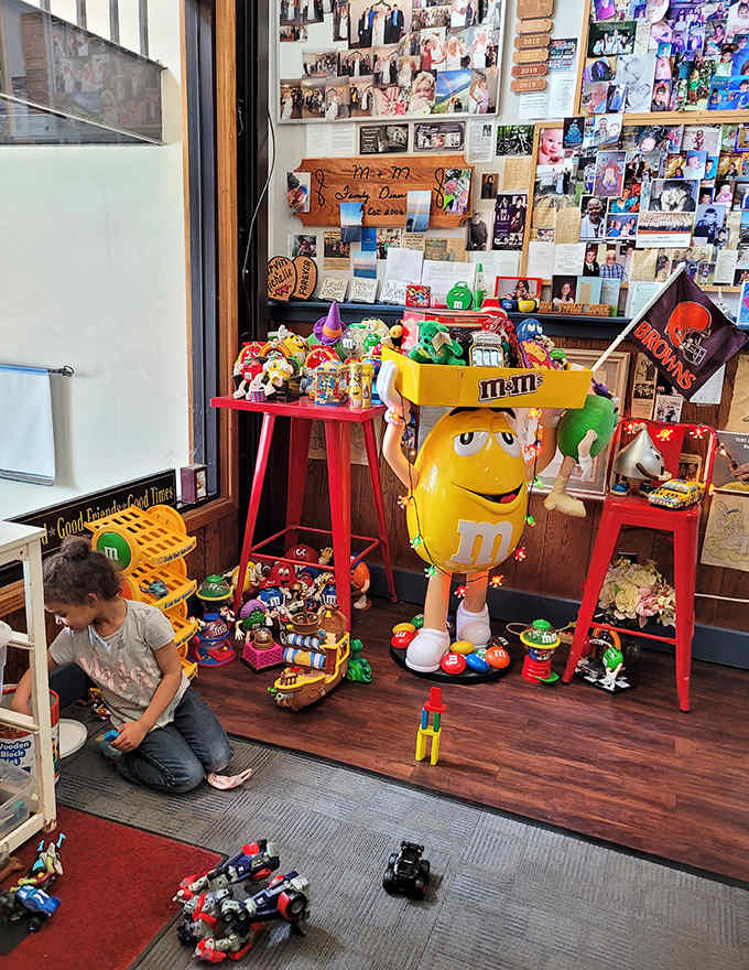 The toy corner where young diners can play while parents enjoy their meal &ndash; complete with a life-sized M&M character standing guard.