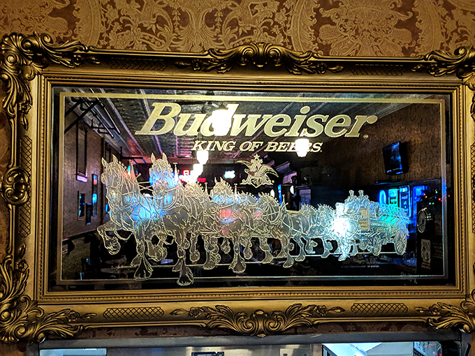 Giddy up and drink up! This Budweiser mirror isn't just bar decor&mdash;it's a gilded gateway to good times, framed by history.