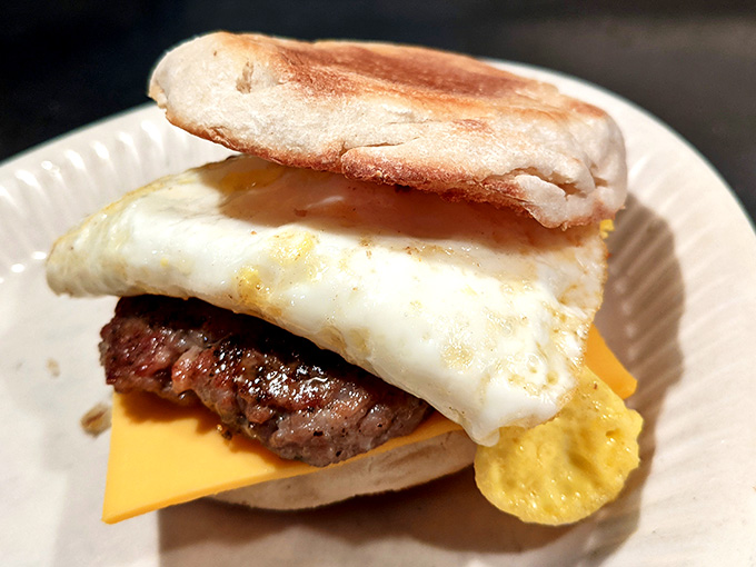 That English muffin sandwich stacks up layers of breakfast perfection worth waking for.