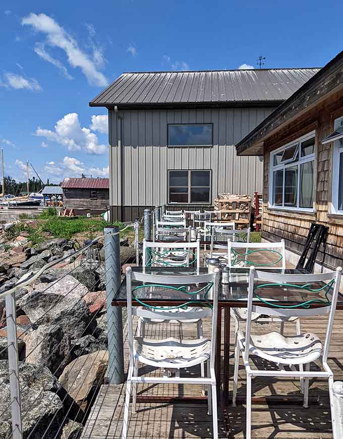 Outdoor seating where you can dine with sailboats, fresh air, and the soundtrack of waves lapping the shore.