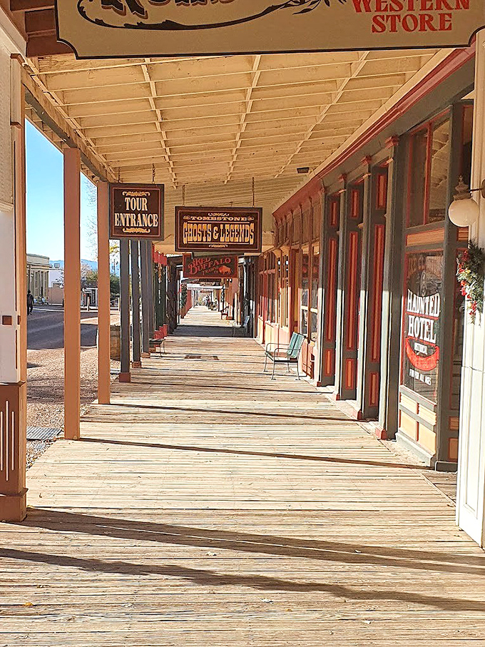 The boardwalk stretches into the distance, its wooden planks worn smooth by thousands of visitors playing cowboy for a day.