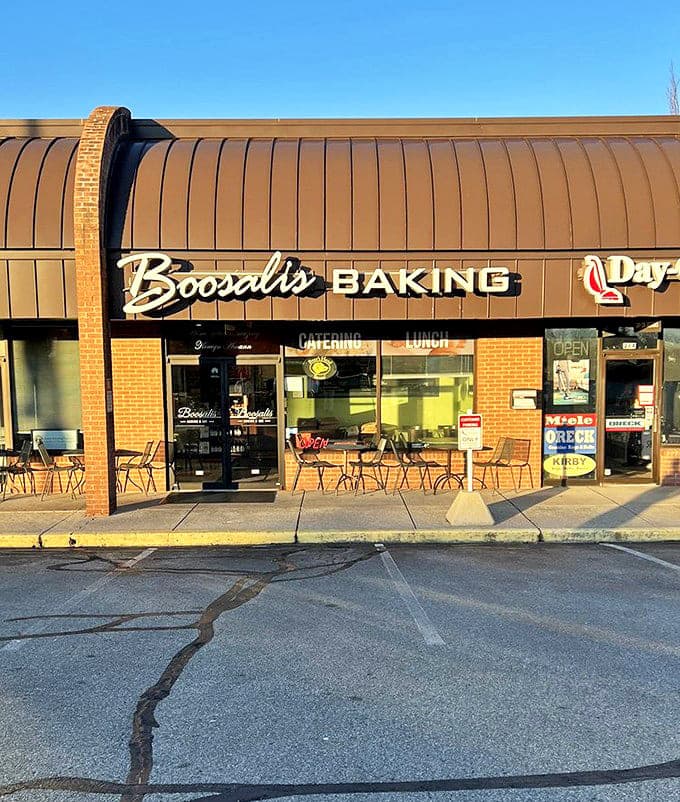 The evening sun casts a golden glow on Boosalis Baking, as if nature itself is highlighting this temple of buttery delights.