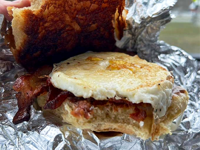 The breakfast sandwich that launched a thousand road trips. Melty cheese, crispy bacon, and that perfectly cooked egg? Morning perfection.