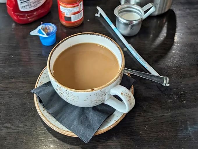 That perfect cup of coffee &ndash; rich amber liquid in a sturdy mug, the unsung hero of every great breakfast experience.