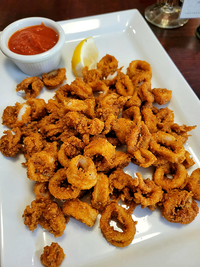 Crispy calamari so tender you'll wonder if they've discovered some secret squid-whispering technique in the kitchen. 