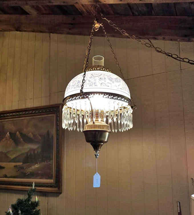 This hanging lamp with delicate glass detailing once illuminated someone's favorite reading nook, and could soon brighten yours with vintage charm.