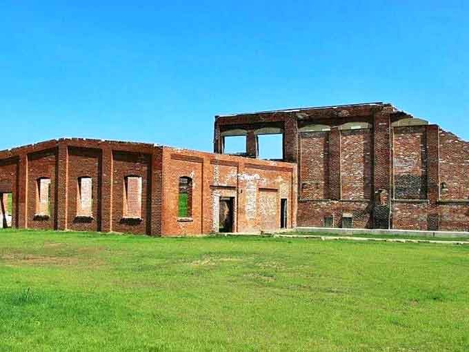 These weathered walls whisper stories of America's manufacturing heyday, now standing as monumental sculptures against Ohio's green landscape.